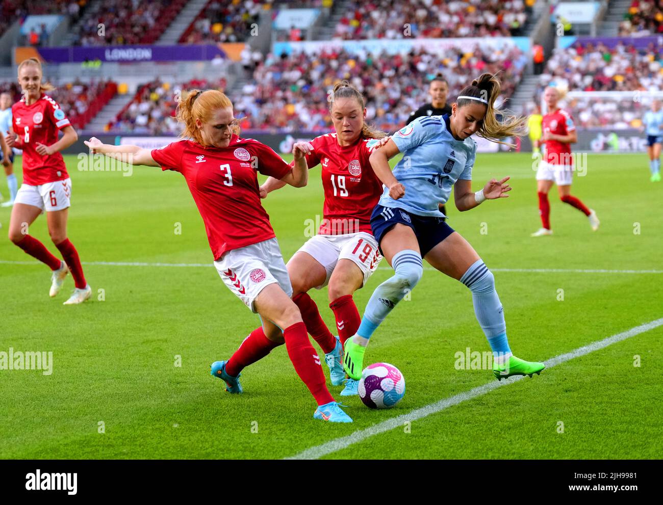 Denmark's Stine Ballisager Pedersen (left) tackles Spain's Athenea del ...