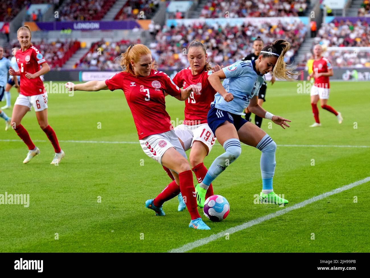 Denmark's Stine Ballisager Pedersen (left) tackles Spain's Athenea del ...