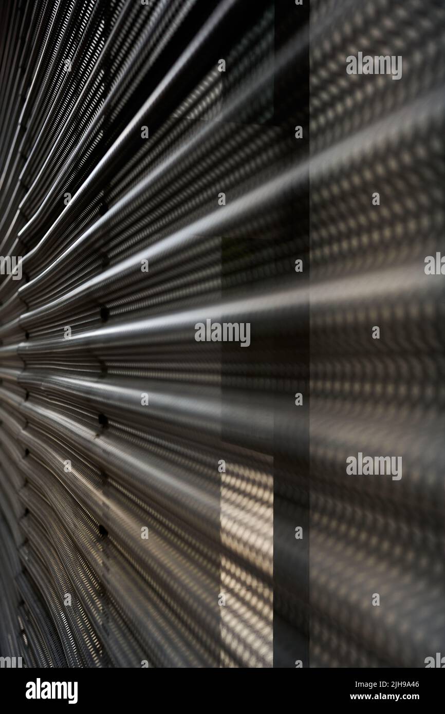 black and white abstraction of architectural steel wall with ...