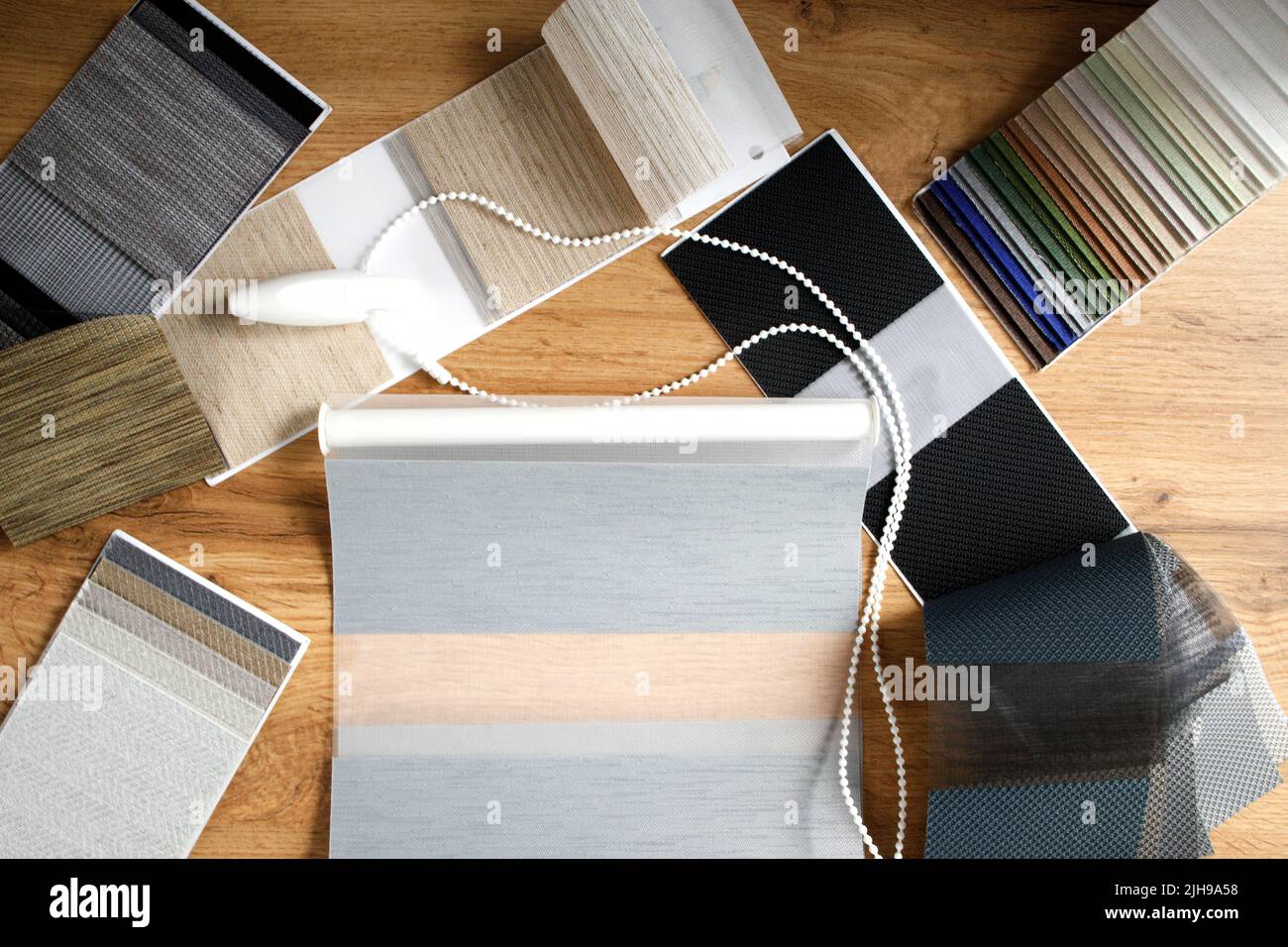 Samples of fabrics of different textures and colors in the form of a ...