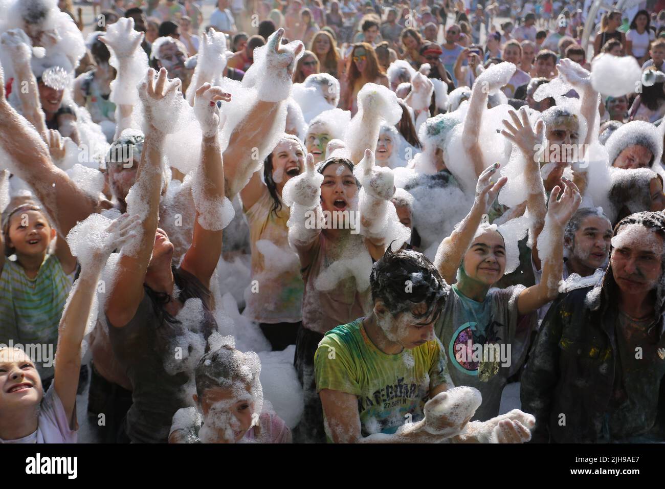 Odessa, Ukraine. 07th Aug, 2021. People covered in foam seen dancing during the event. As a ...
