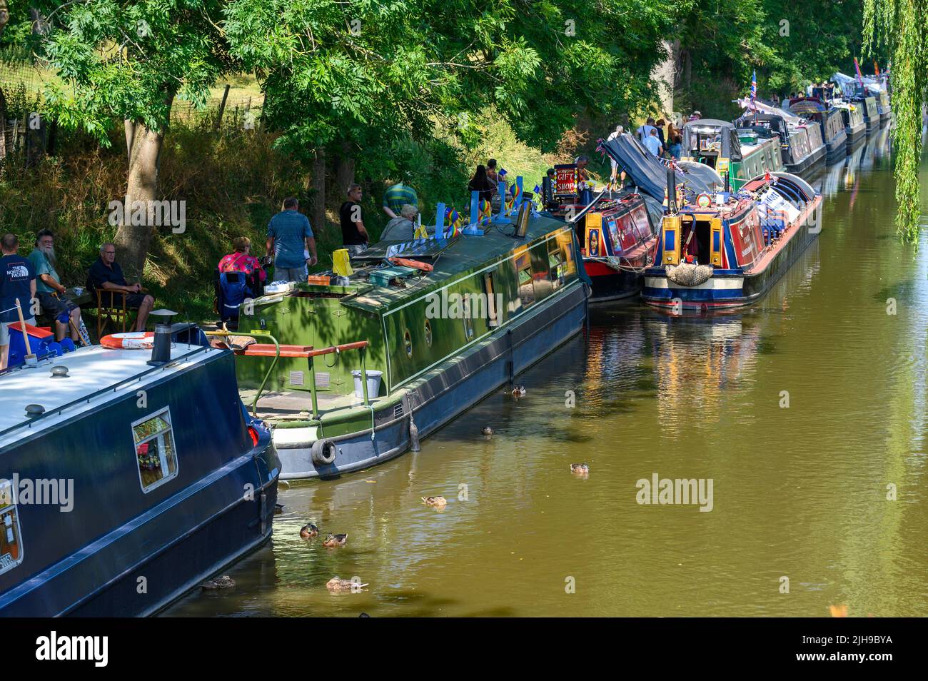Visitors enjoying a canal festival in the village of Gnosall in ...