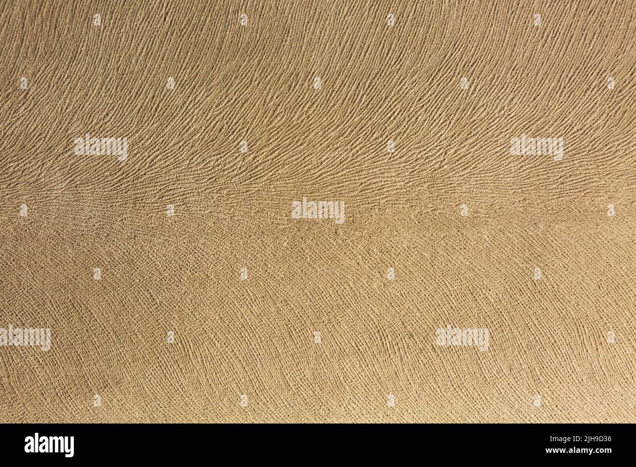 Artificial suede light brown background, textile imitation, velvet ...