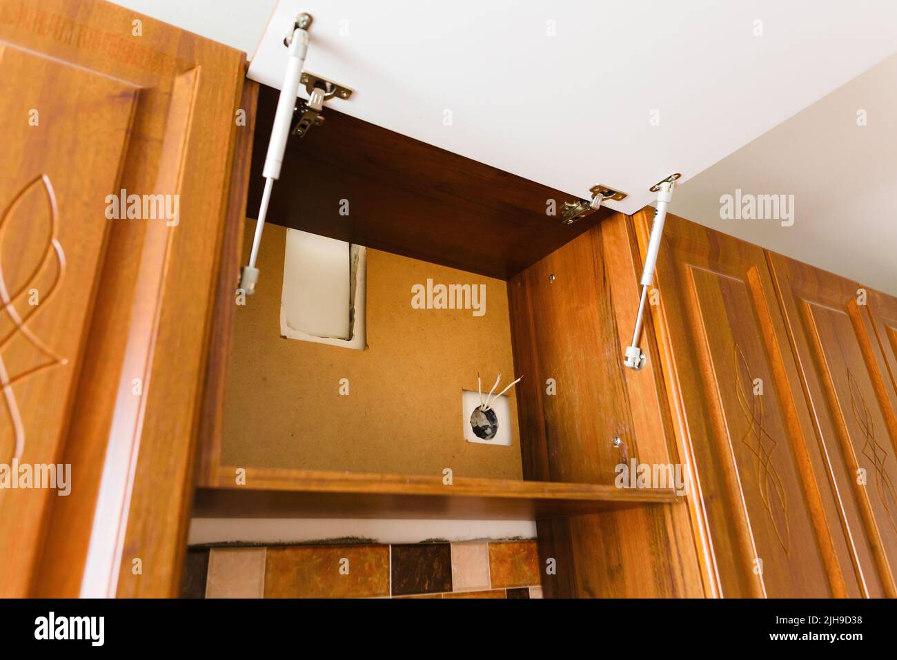 A place for Installation of a kitchen hood, renovation in a new house ...