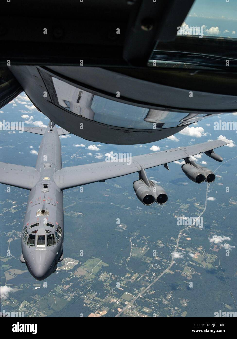 A KC-135 Stratotanker with the 914th Air Refueling Wing, New York, refuels a B-52 Stratofortress ...