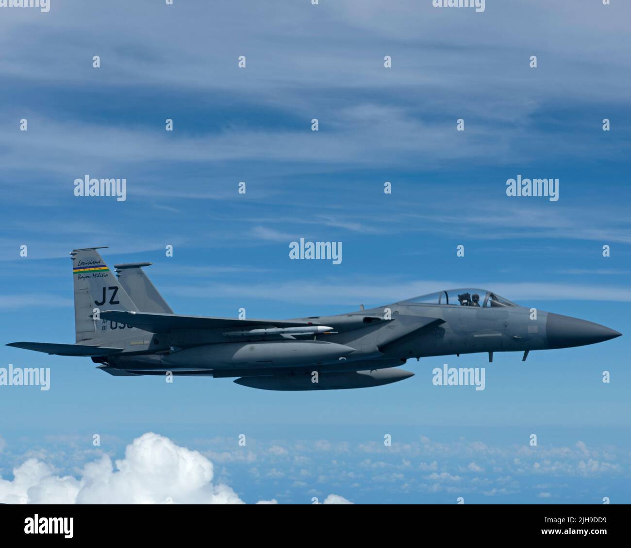 An F-15 Eagle with the 159th Fighter Wing, Louisiana, flies next to a ...