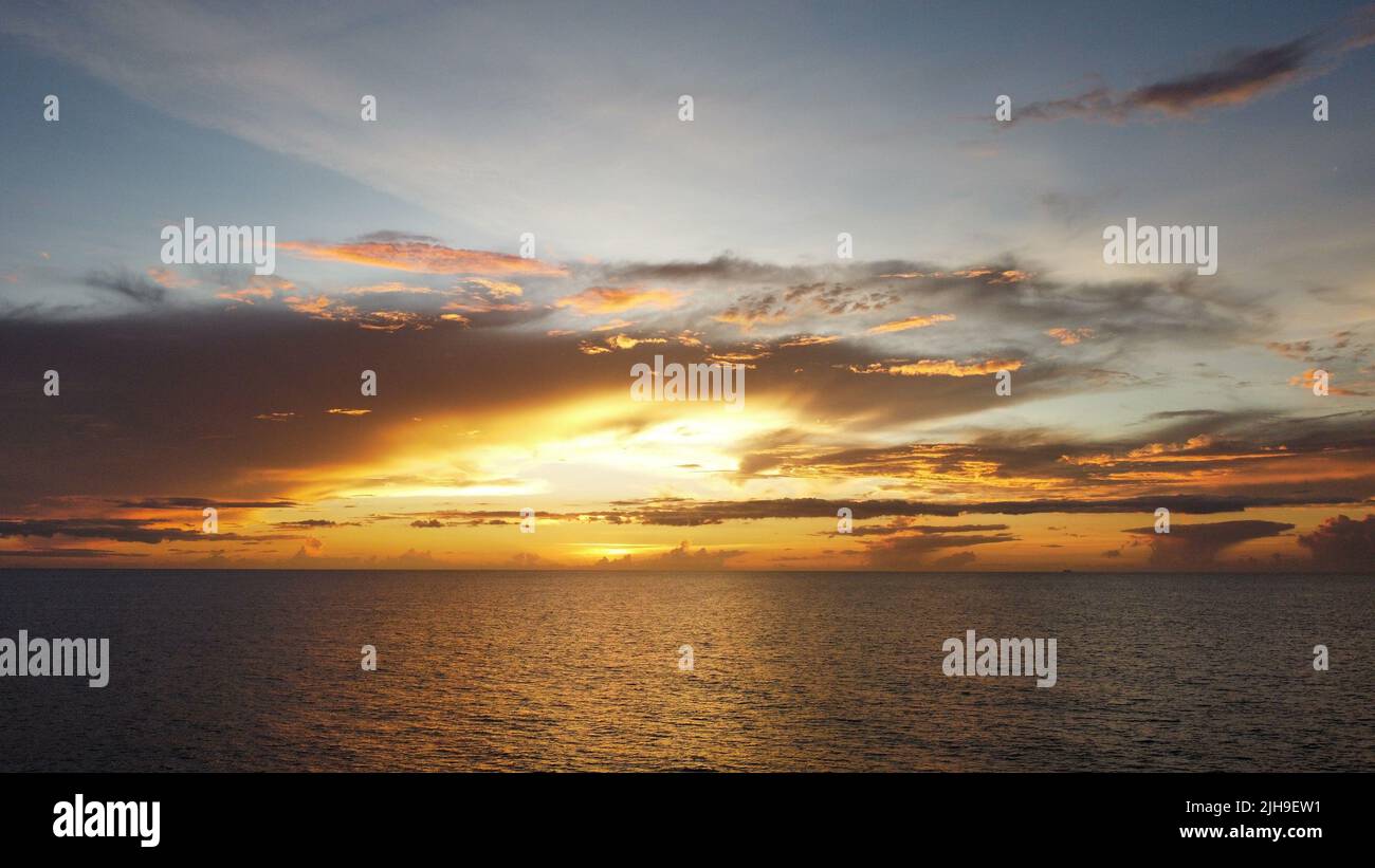 A view of the sunset over the sea Stock Photo - Alamy
