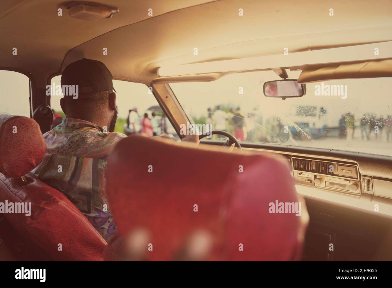 A back view of the black man riding a bus Stock Photo - Alamy