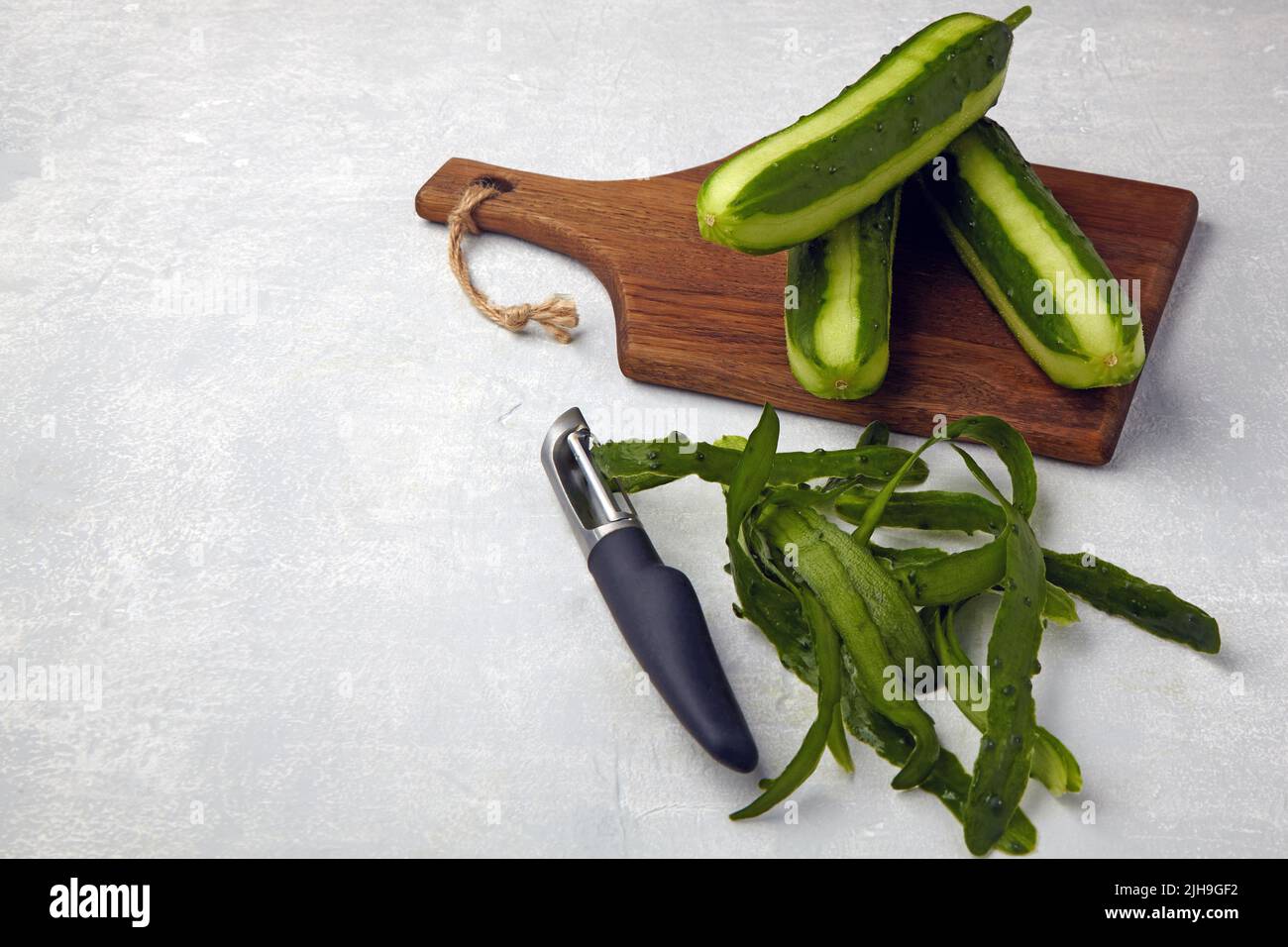Peeling cucumbers hi-res stock photography and images - Alamy