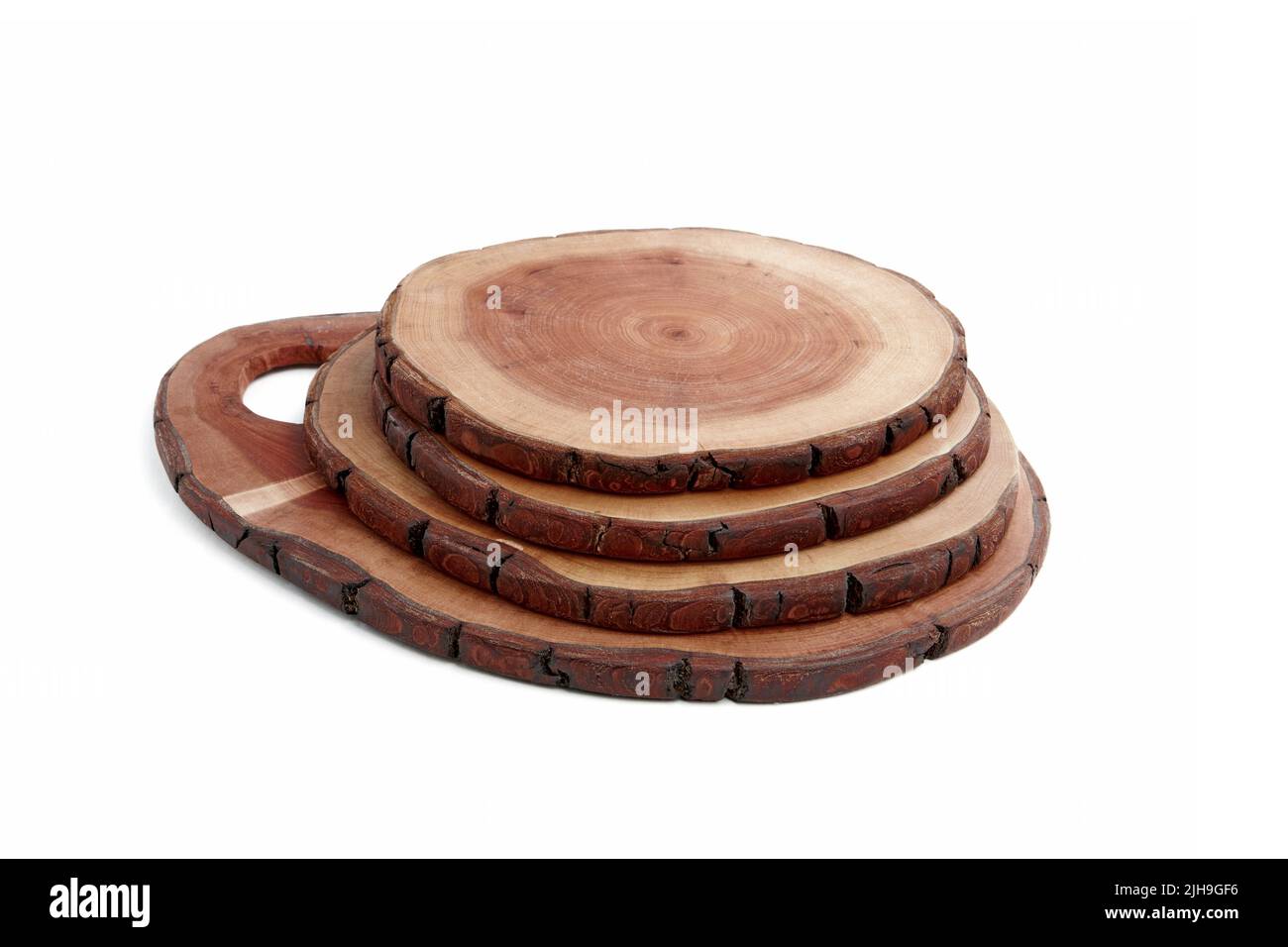 Wooden cutting boards isolated on white background. Tree trunk cut for ...