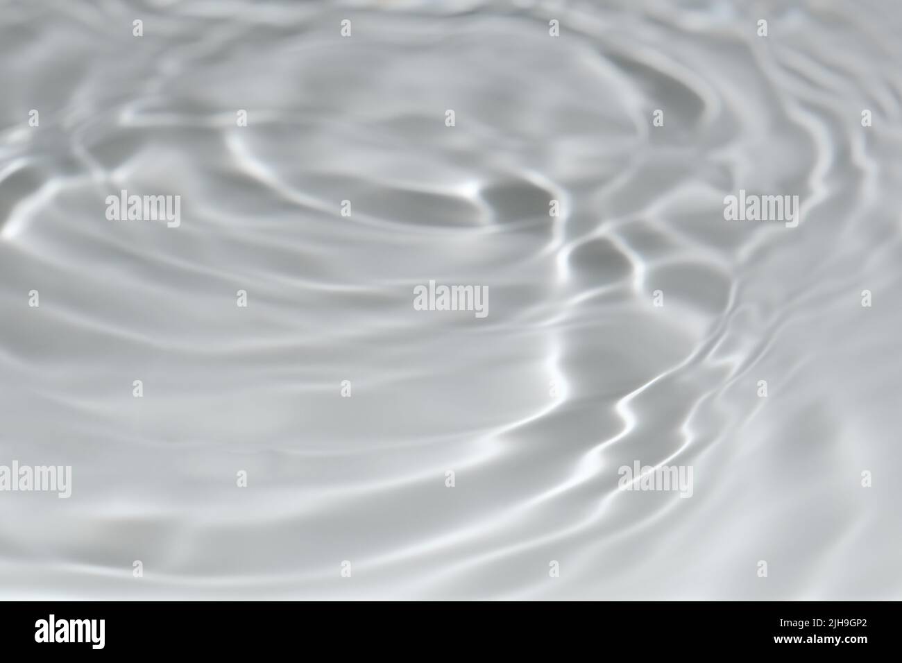 Light gray transparent clear calm water surface texture with splashes ...