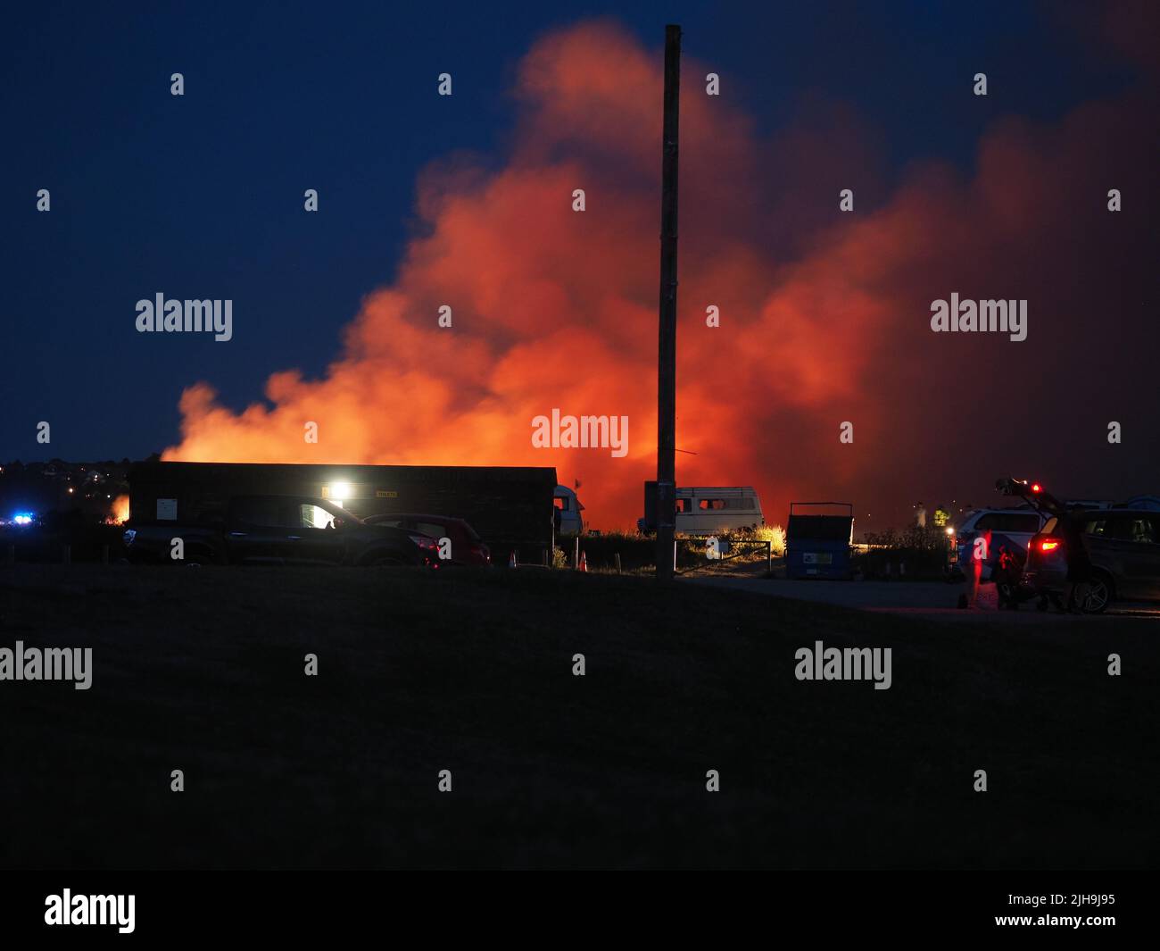 Sheerness, Kent, UK. 16th July, 2022. Dried-out grass caught alight at ...