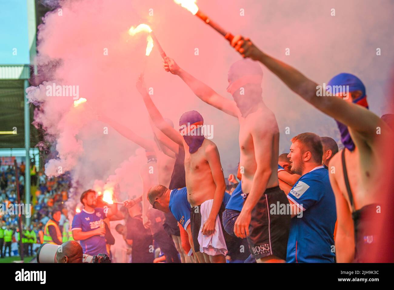 Rangers light flares and weak masks during the game Stock Photo - Alamy