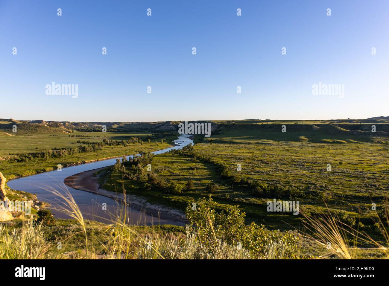 A landscape featuring the Missouri River at Theodore Roosevelt National ...