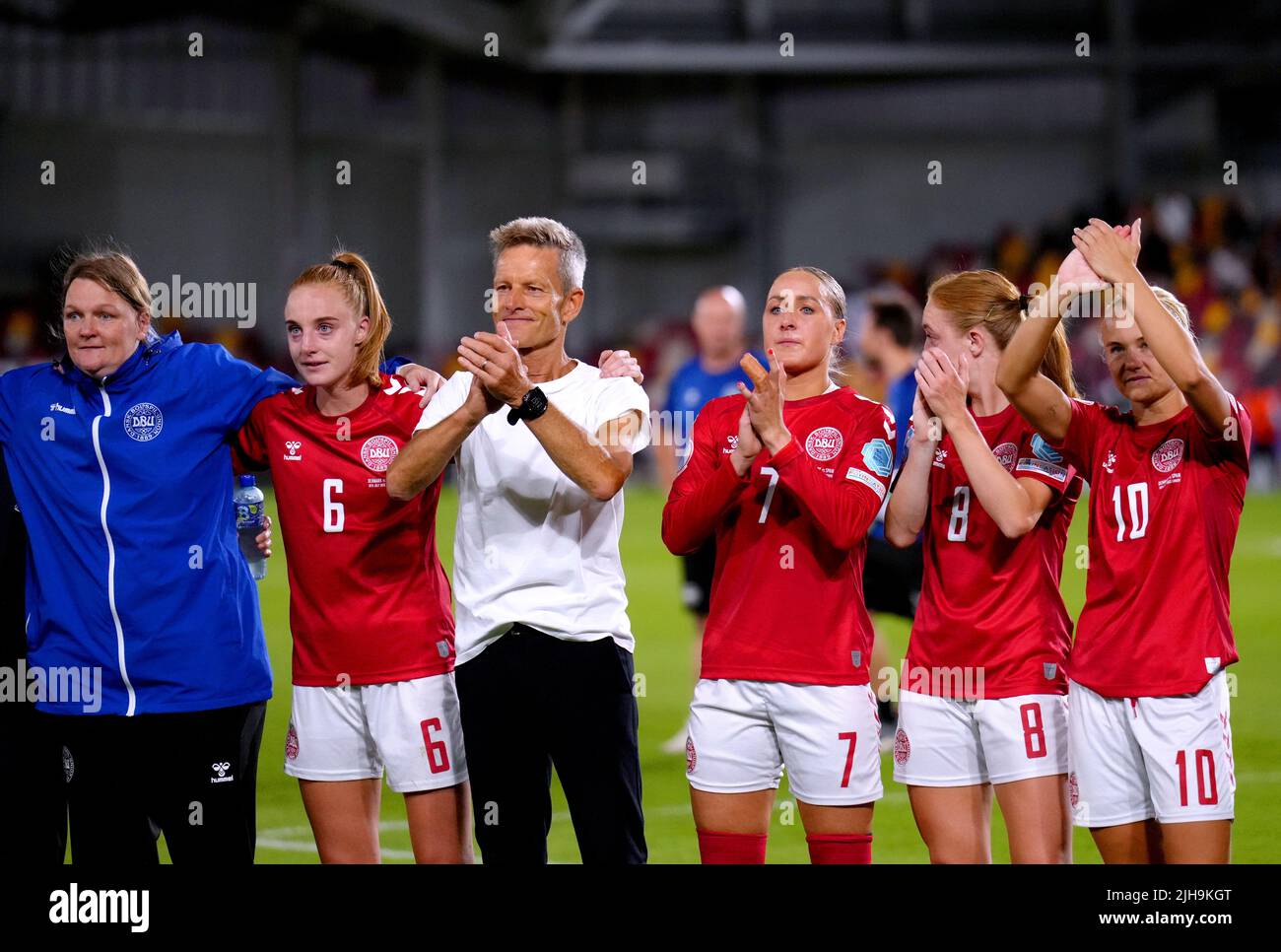 Denmark head coach Lars Sondergaard and his players applaud the fans at ...