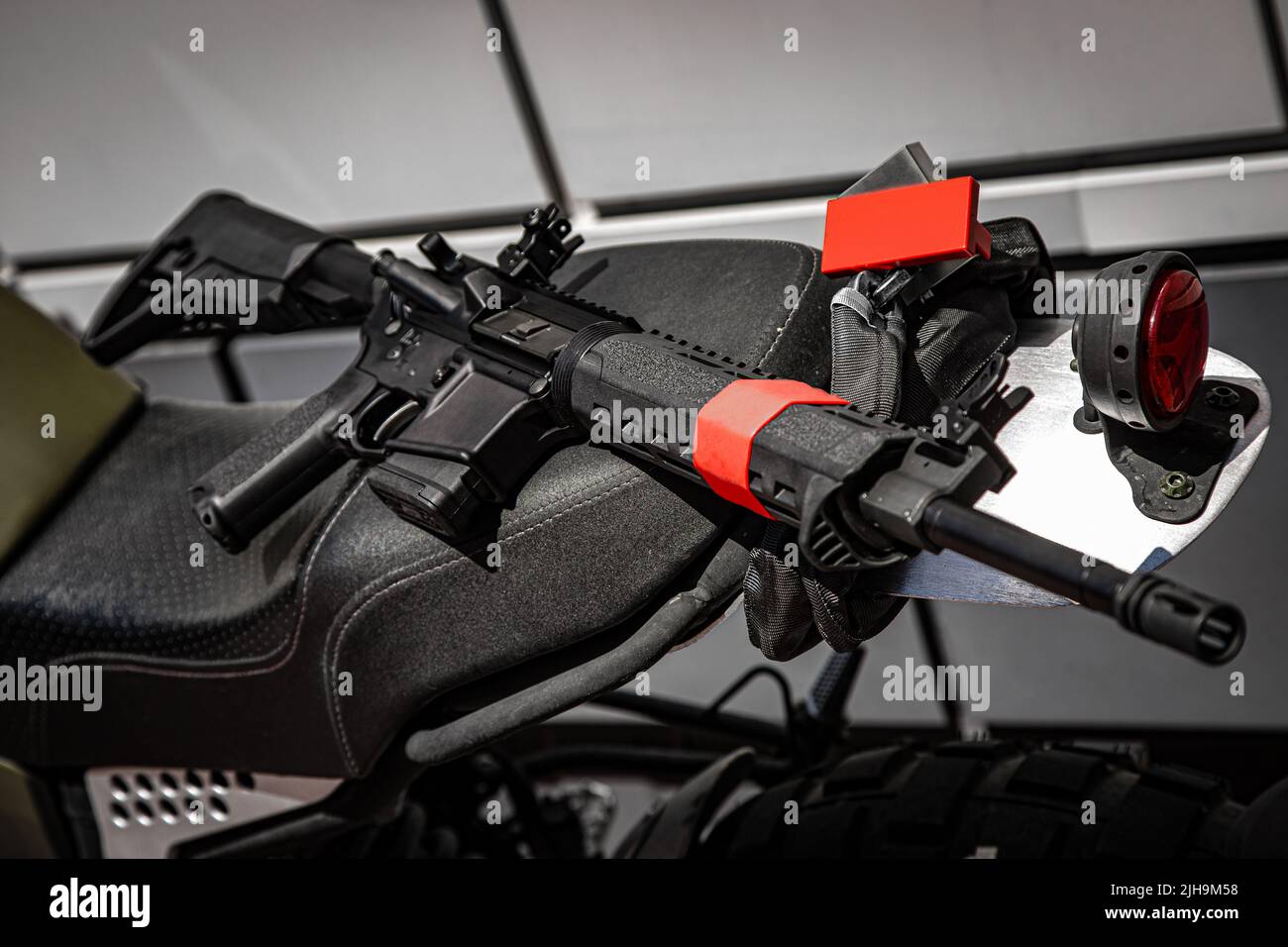 Automatic carabiner on a motorcycle. Weapons for police, special forces ...