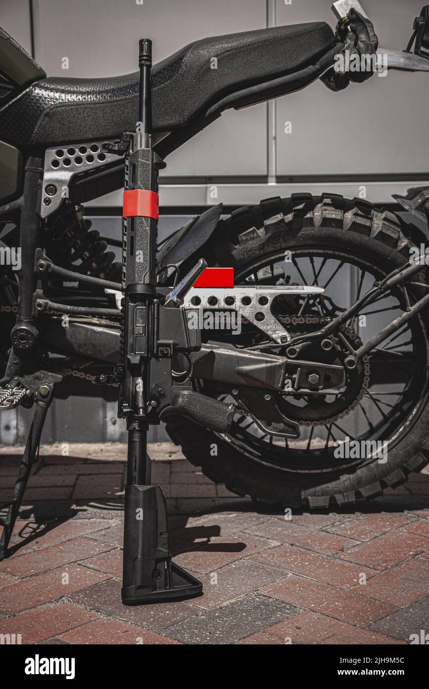 Automatic carabiner on a motorcycle. Weapons for police, special forces ...