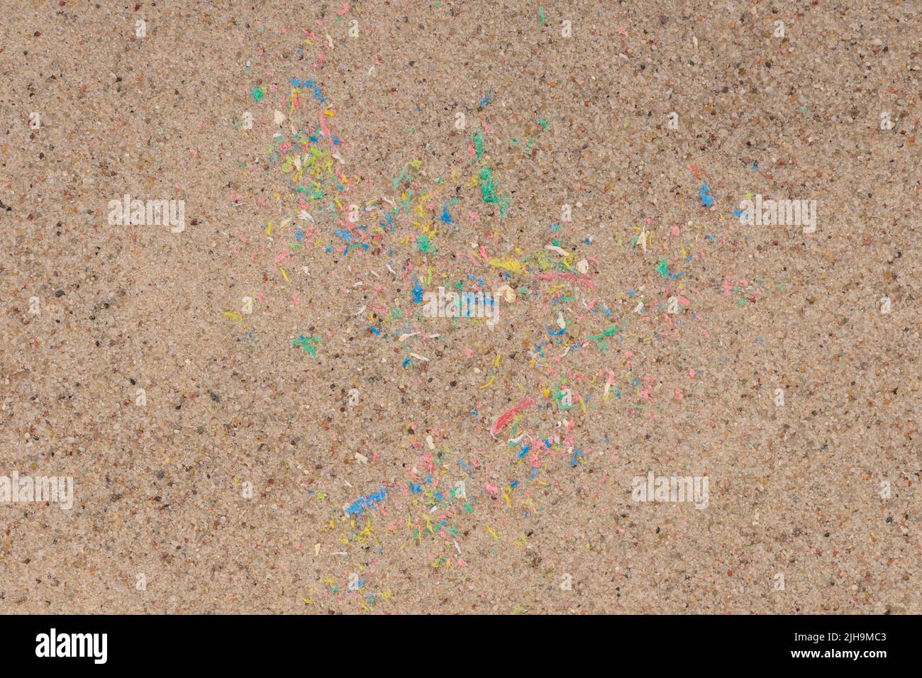 Micro plastic in sand on beach, colorful plastic particles Stock Photo ...