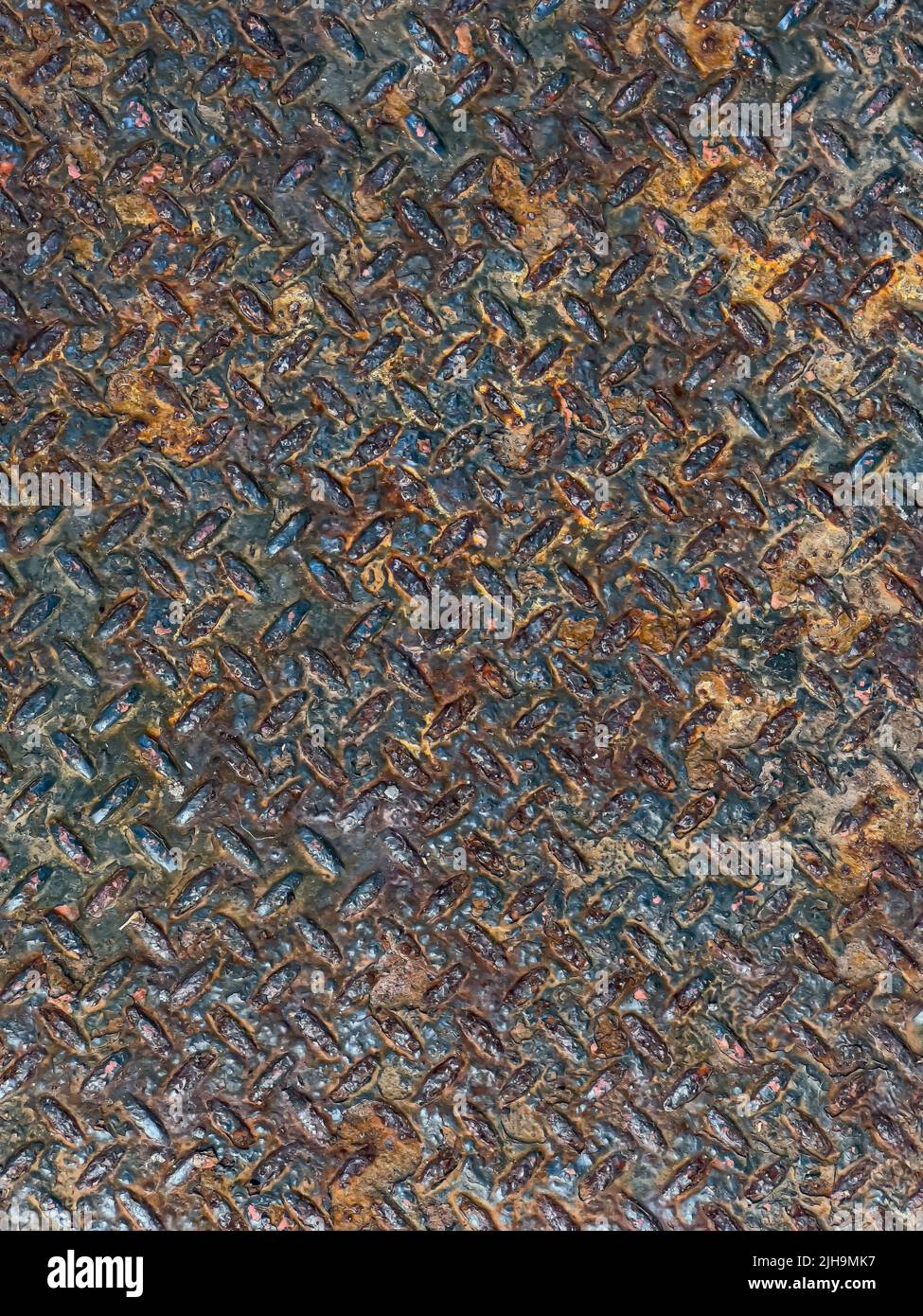 STeel grating or cover with heavy wear and rust Stock Photo - Alamy