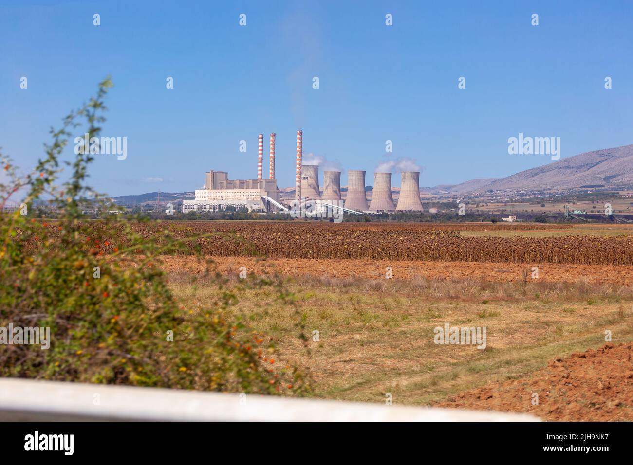 A thermoelectric coal power plant Amyntaio in Greece, with big chimneys ...