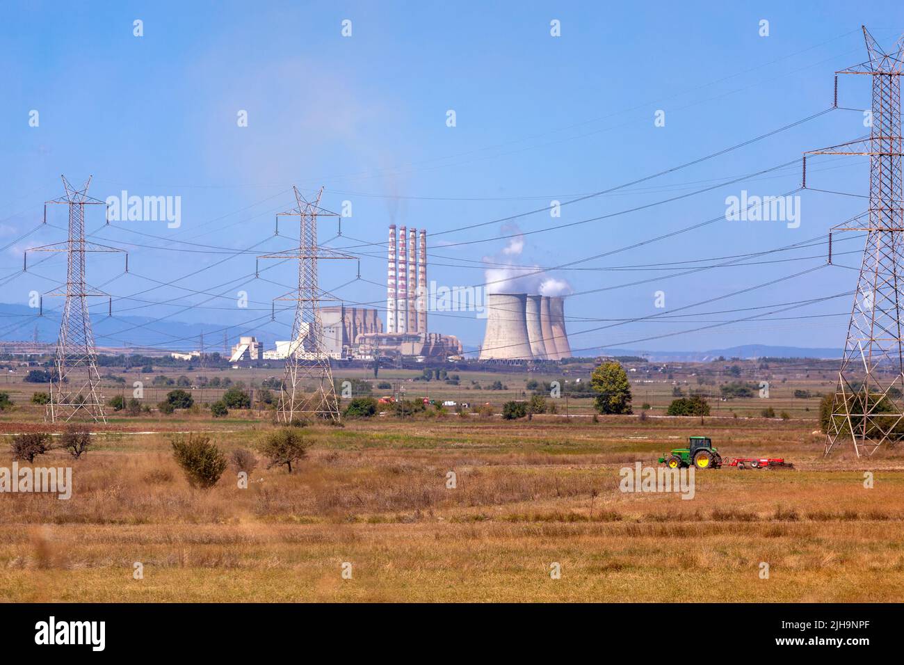 A thermoelectric coal power plant Amyntaio in Greece, with big chimneys ...
