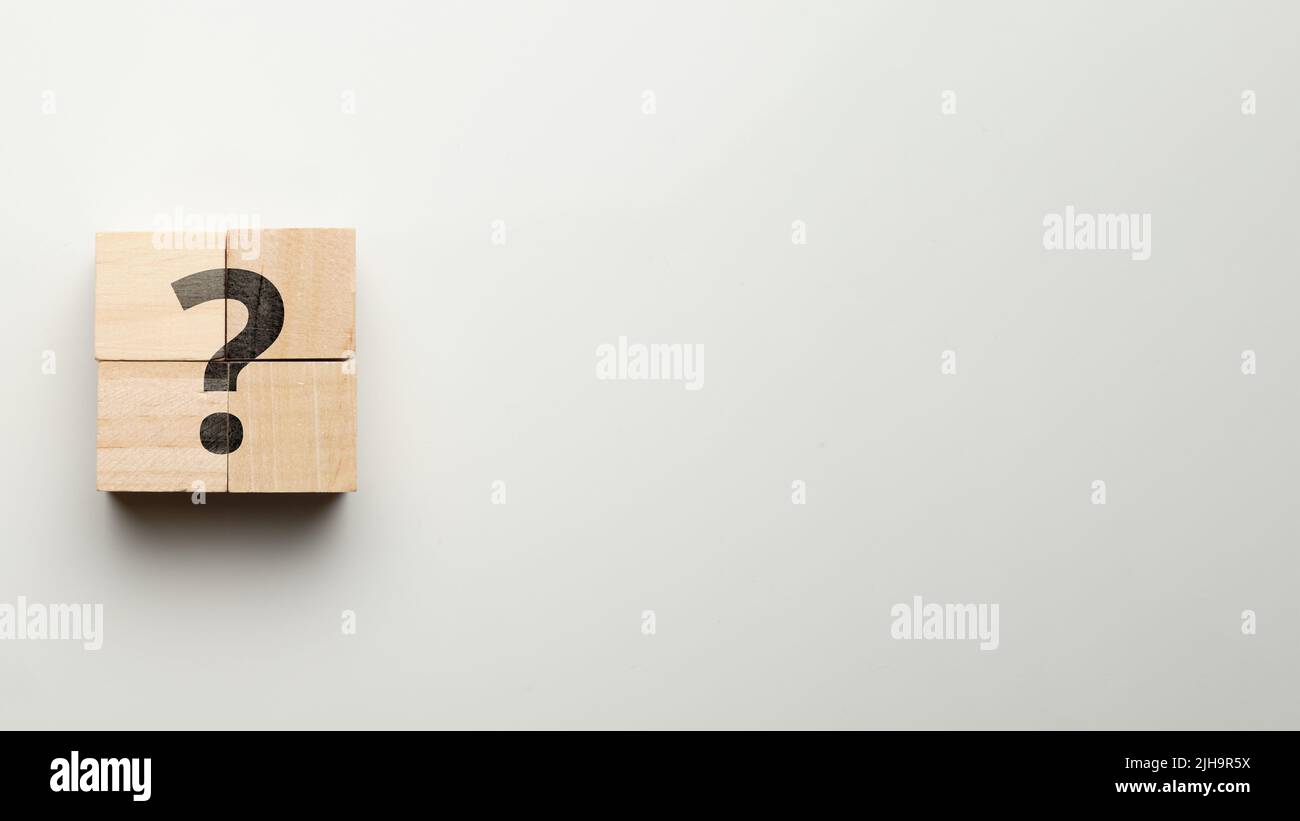 Question mark concept or FAQ. Sign on wooden cubes with copy space ...