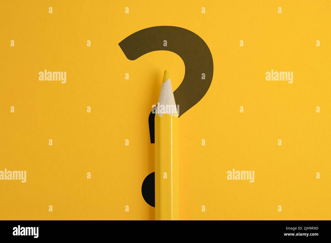 Question mark concept or FAQ. Sign under colored pencil Stock Photo - Alamy