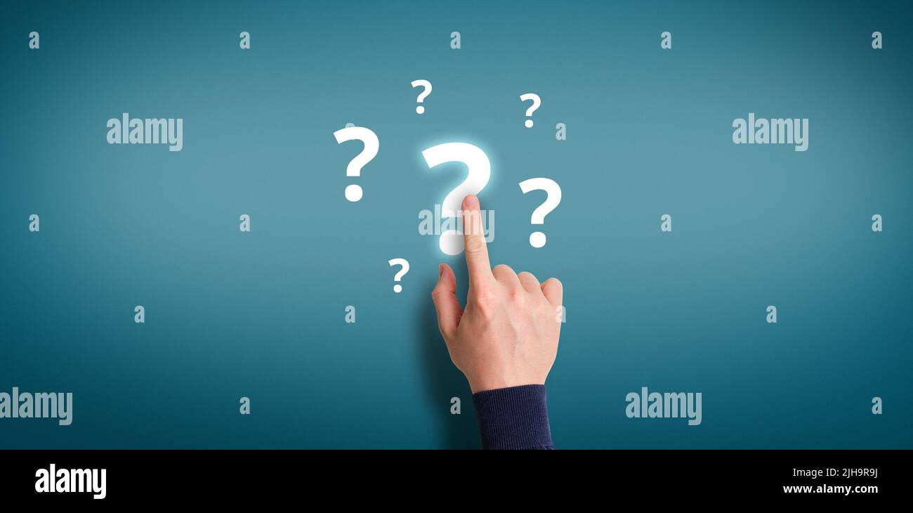Question mark concept or FAQ. Person's hand touching a holographic sign ...