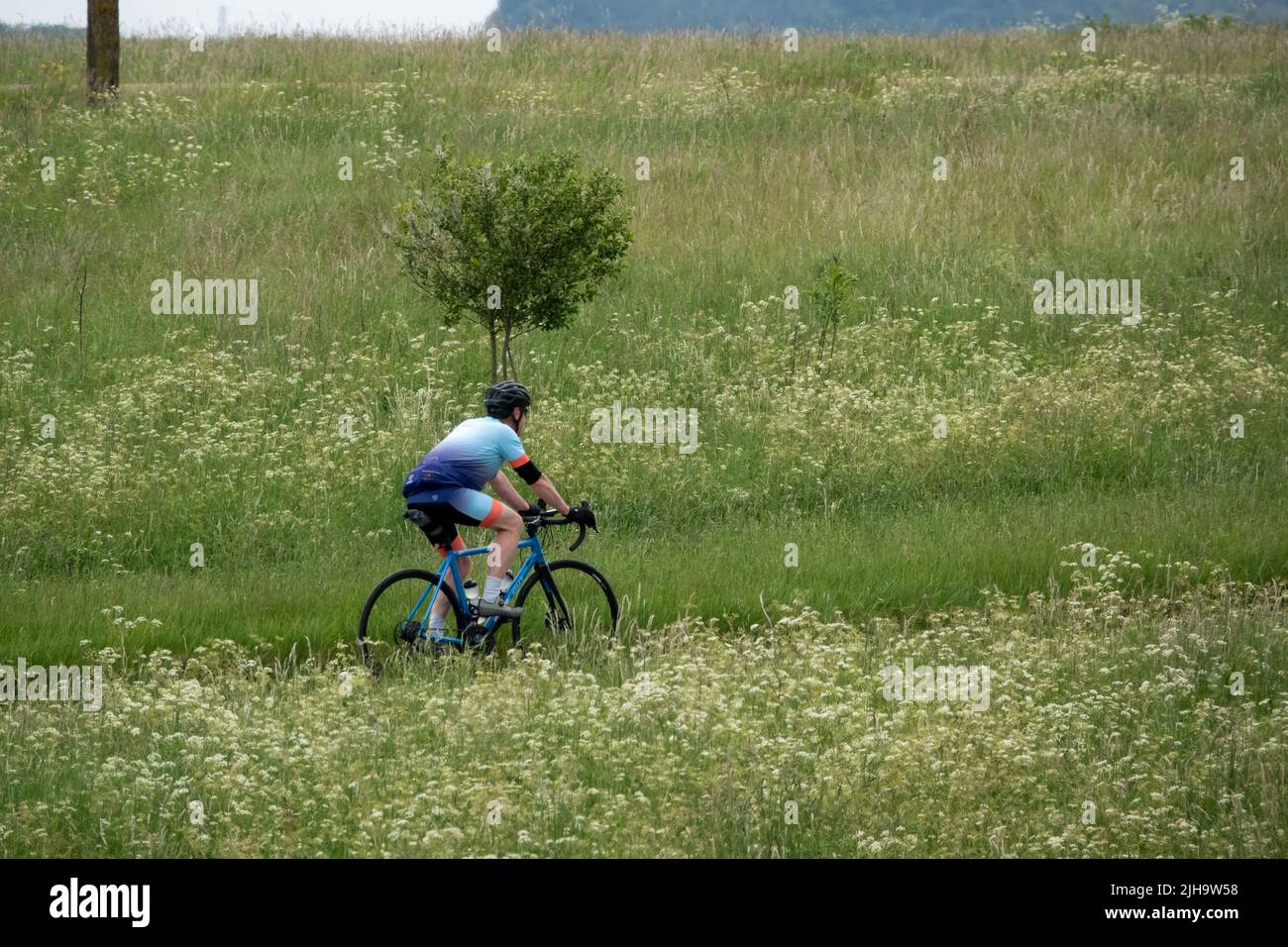 Cyclist in action hi-res stock photography and images - Alamy