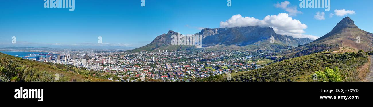 Panoramic landscape of Table mountain and surrounding urban town and a ...