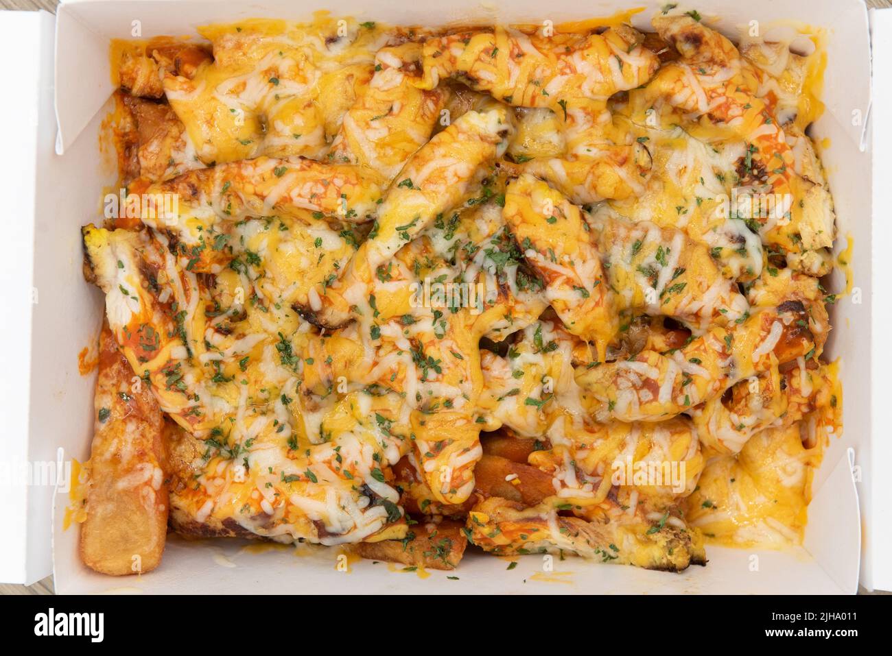 Overhead view of hearty side order of buffalo chicken french fries ...