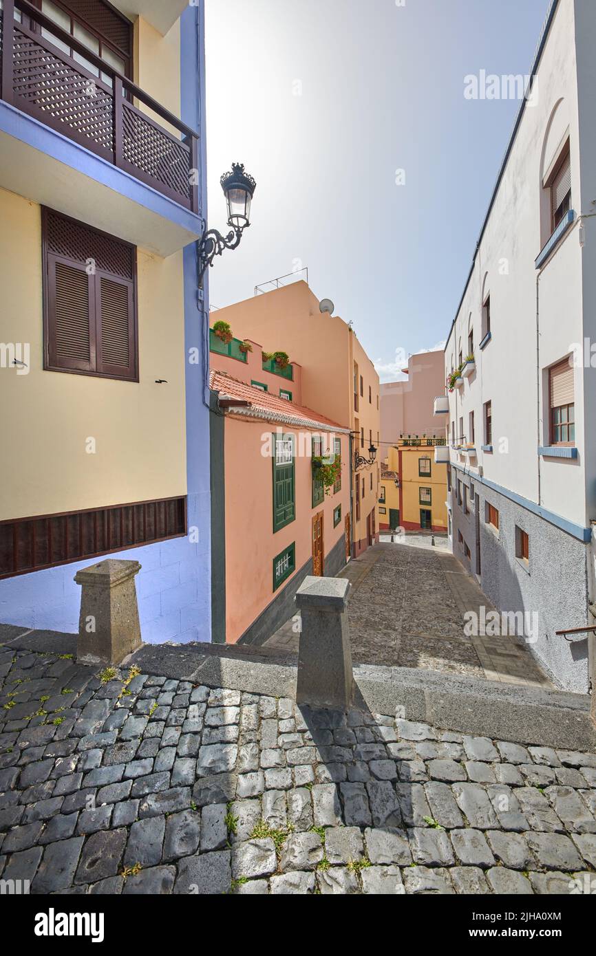 Street view of colorful residential houses or buildings in a quiet ...