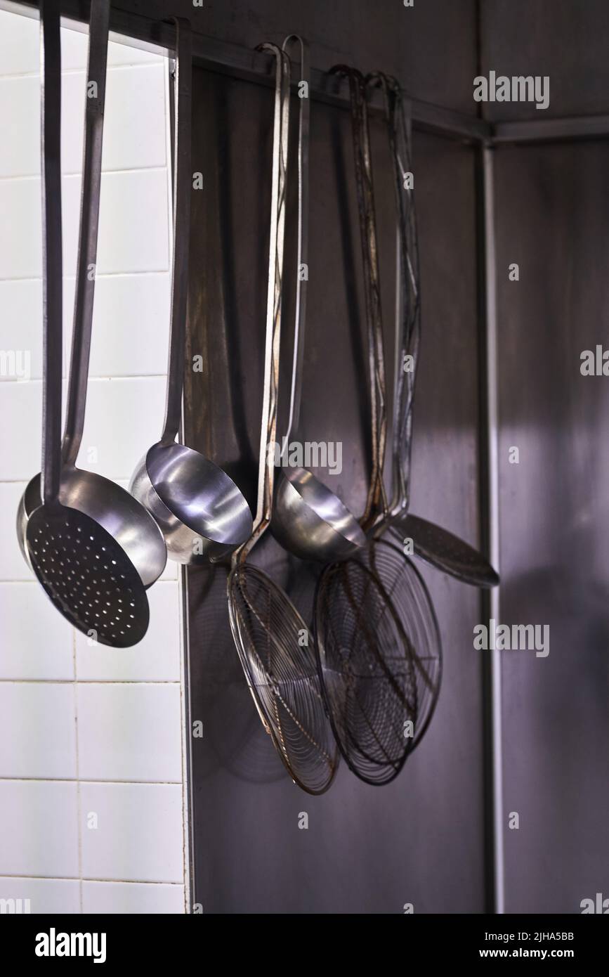 Large cutlery and professional kitchen tools Stock Photo - Alamy