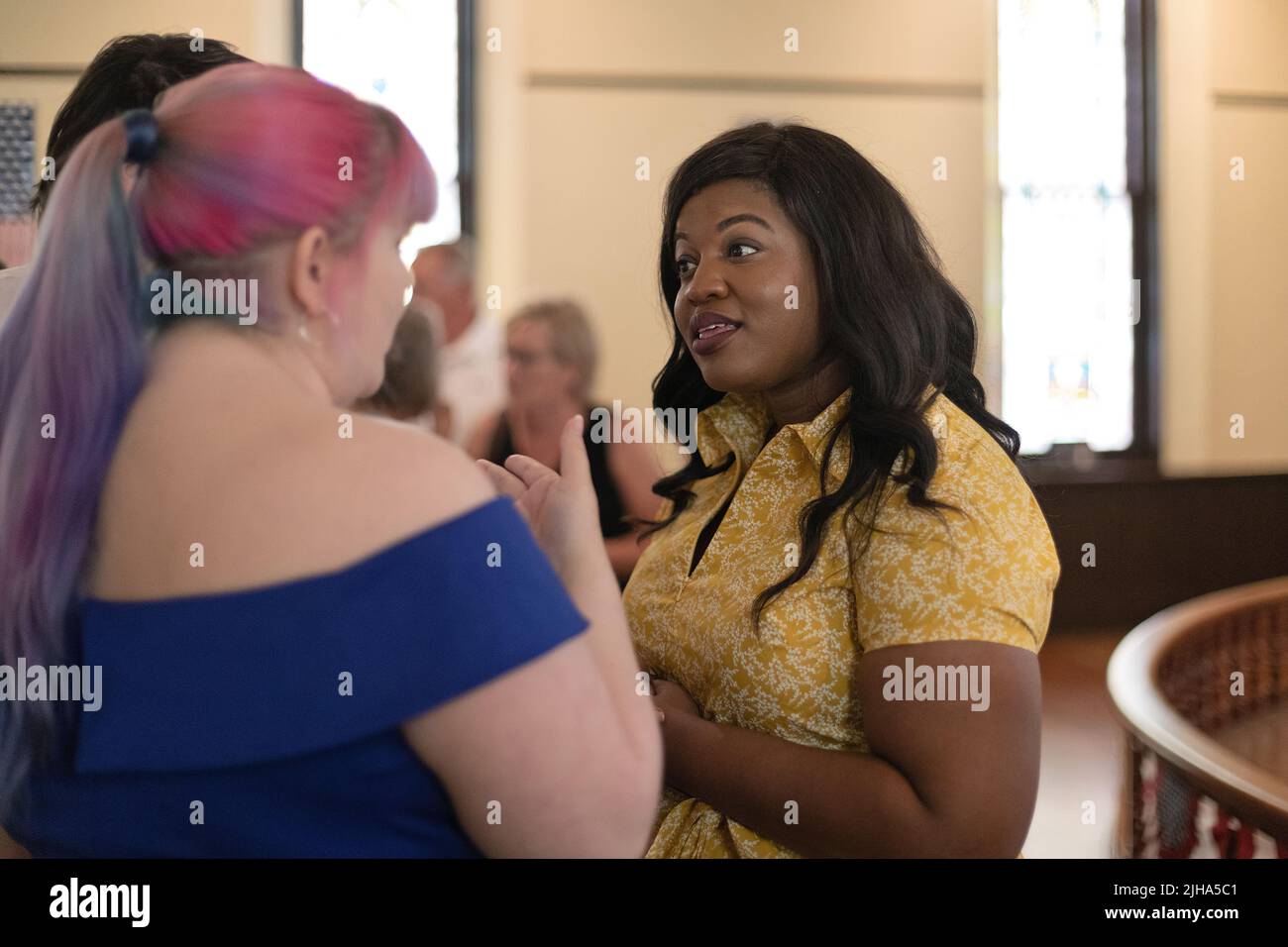 Iowa Democratic gubernatorial candidate Deidre DeJear holding a ...