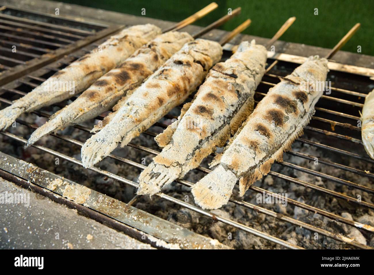 Grilled snake-head fish on white isolated Stock Photo - Alamy