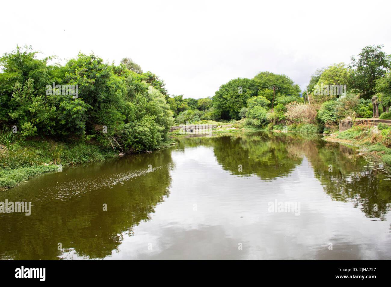 stone carved exterior, abandoned temple, river Stock Photo - Alamy