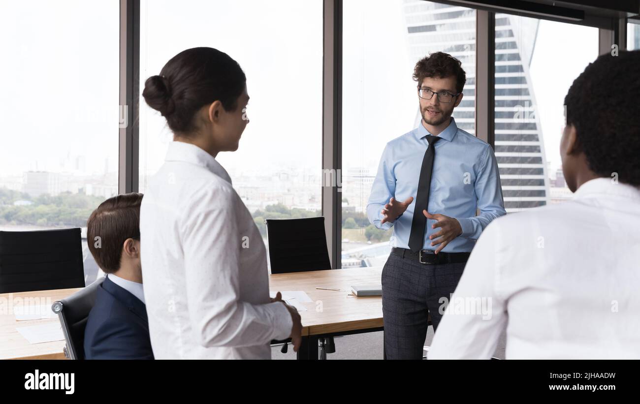 Black boss speaking to employees hi-res stock photography and images - Alamy