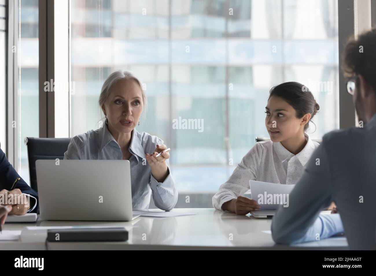 Diverse HR team and senior female boss holding job interview Stock ...