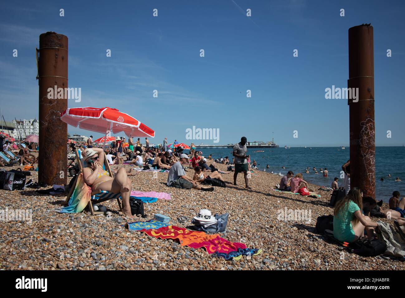 Brighton, UK. July, 2022. Sunbathers on Brighton beach, East Sussex ...