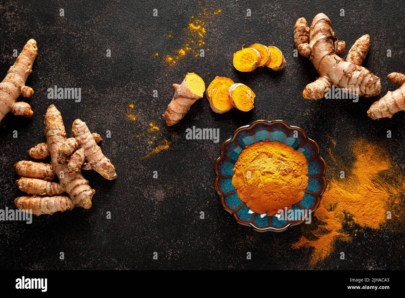 Turmeric. Fresh turmeric root and turmeric, curcumin powder Stock Photo ...