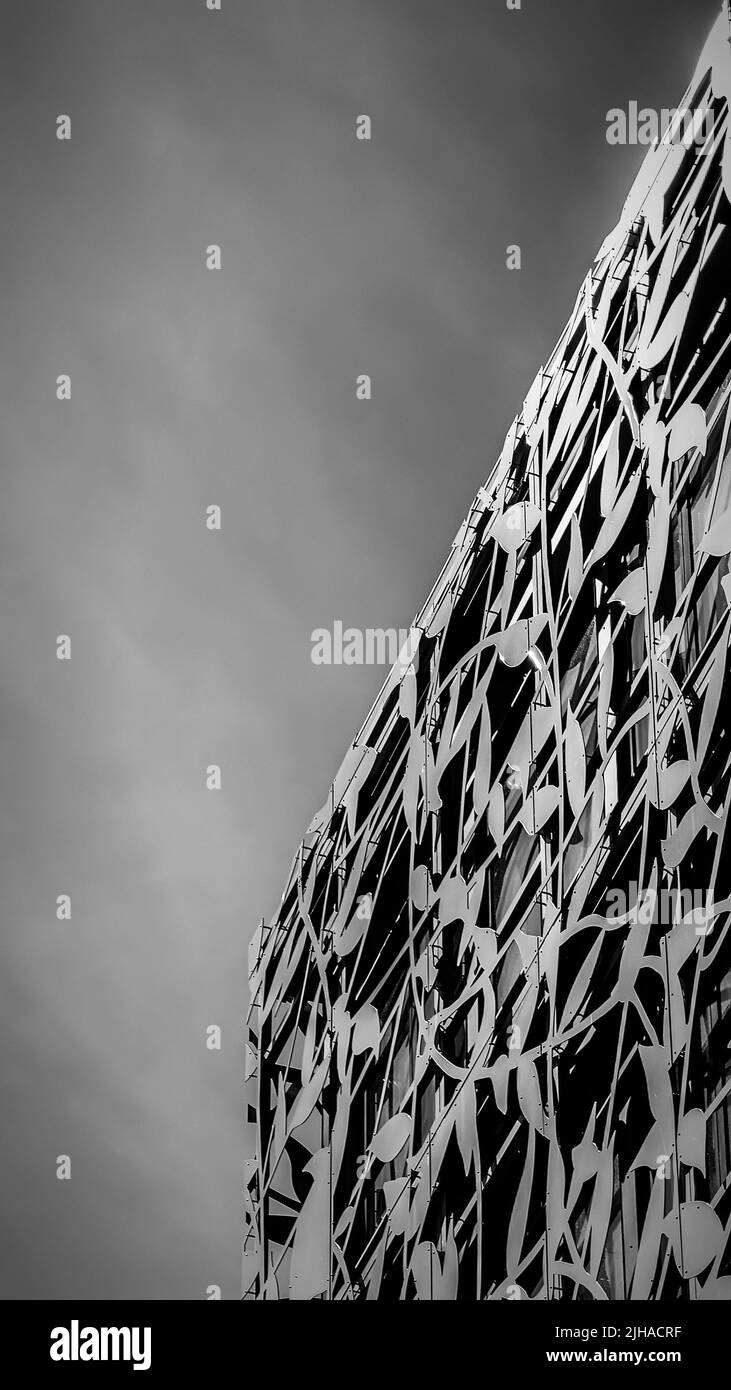 A vertical grayscale shot of the Magnentus tower, a coworking space in ...