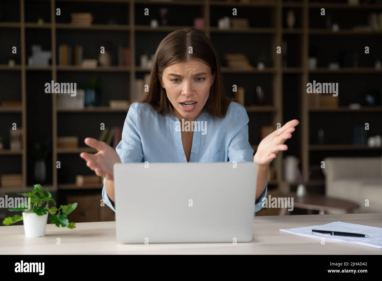 Annoyed stressed businesswoman having problem with laptop Stock Photo ...