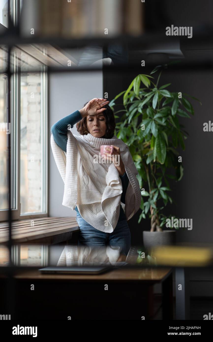 Unhealthy woman touching hot forehead suffer from fever from covid-19 ...