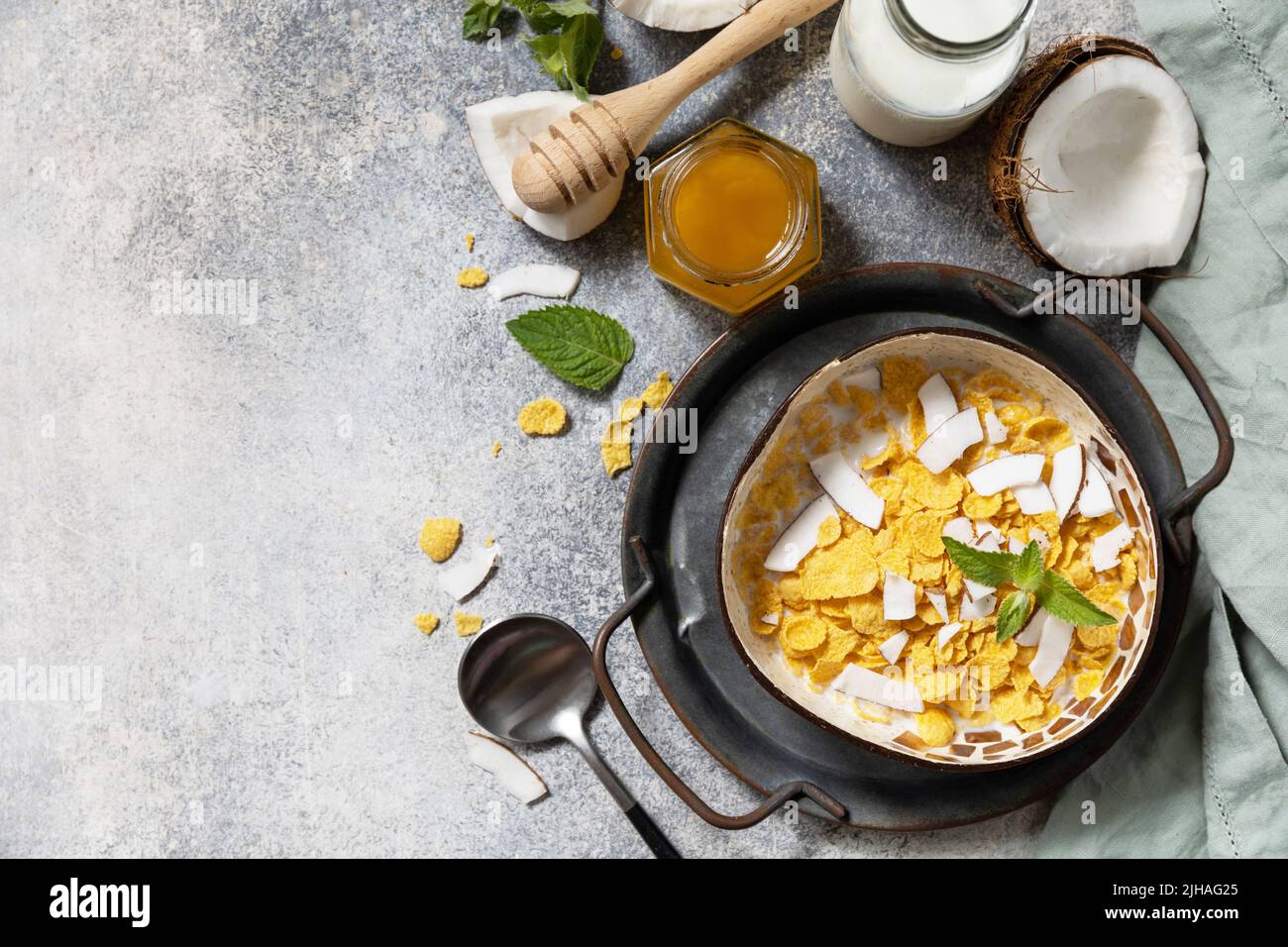 Vegan healthy breakfast. Cereal granola breakfast flakes with coconut ...