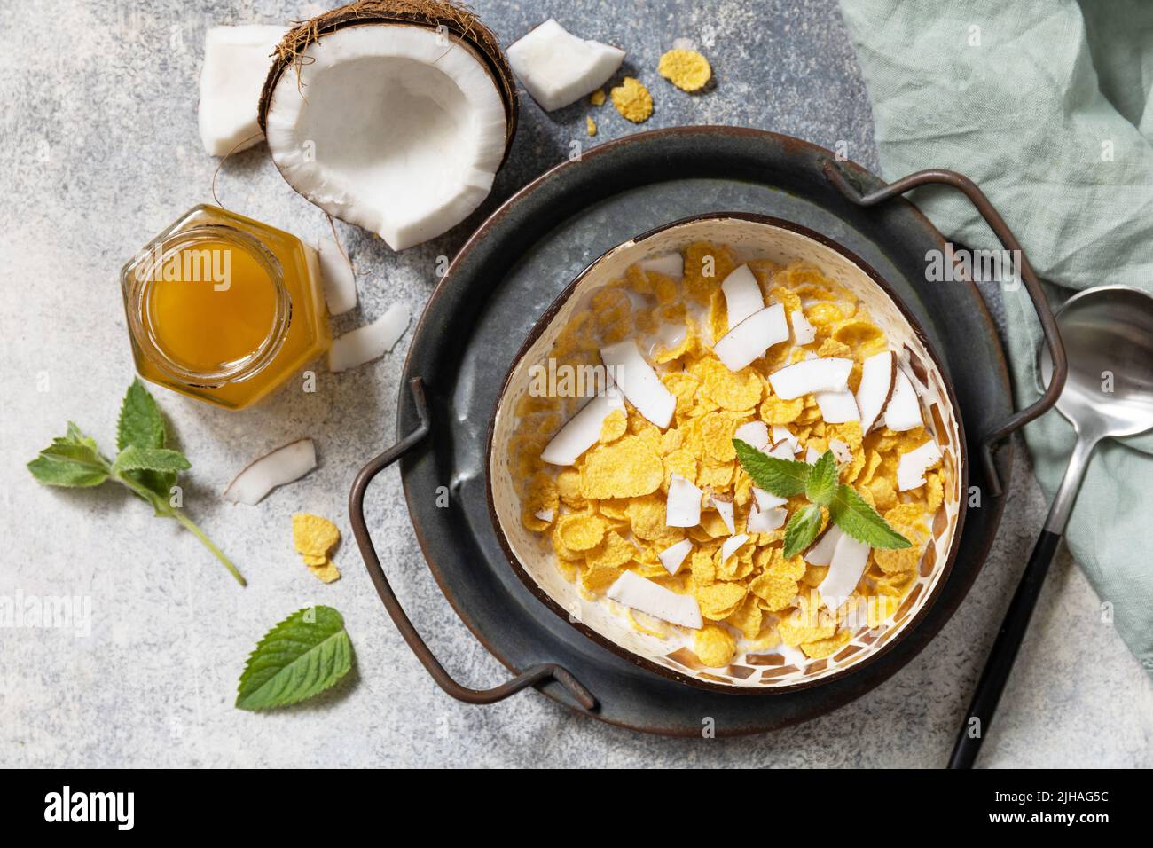 Vegan healthy breakfast. Cereal granola breakfast flakes with coconut ...