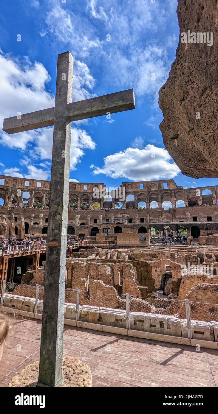 A vertical shot of Christian cross inside the Roman Colosseum Stock ...