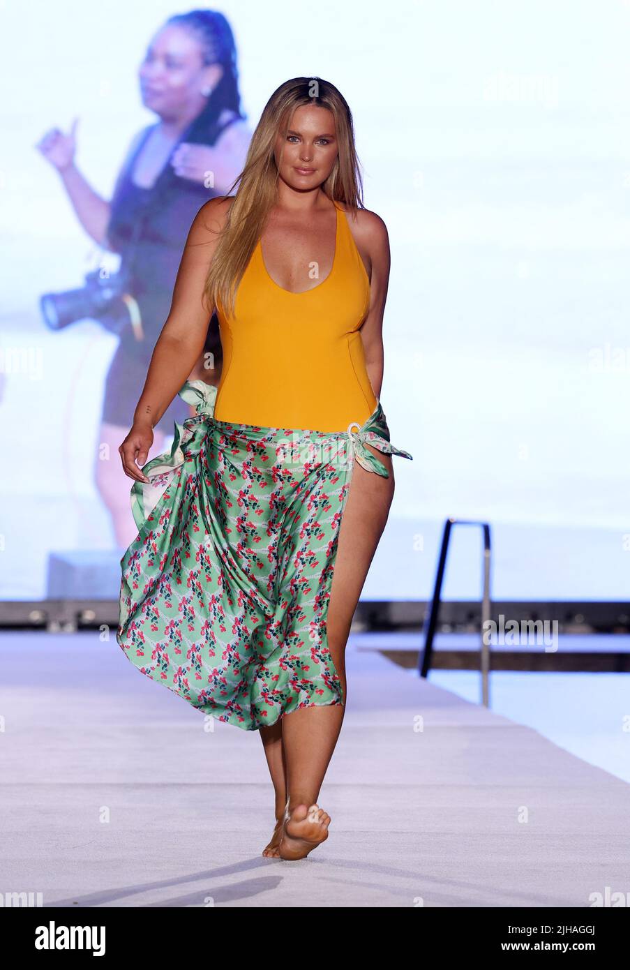 MIAMI BEACH, FLORIDA - JULY 16: Georgina Burke walks the runway for ...
