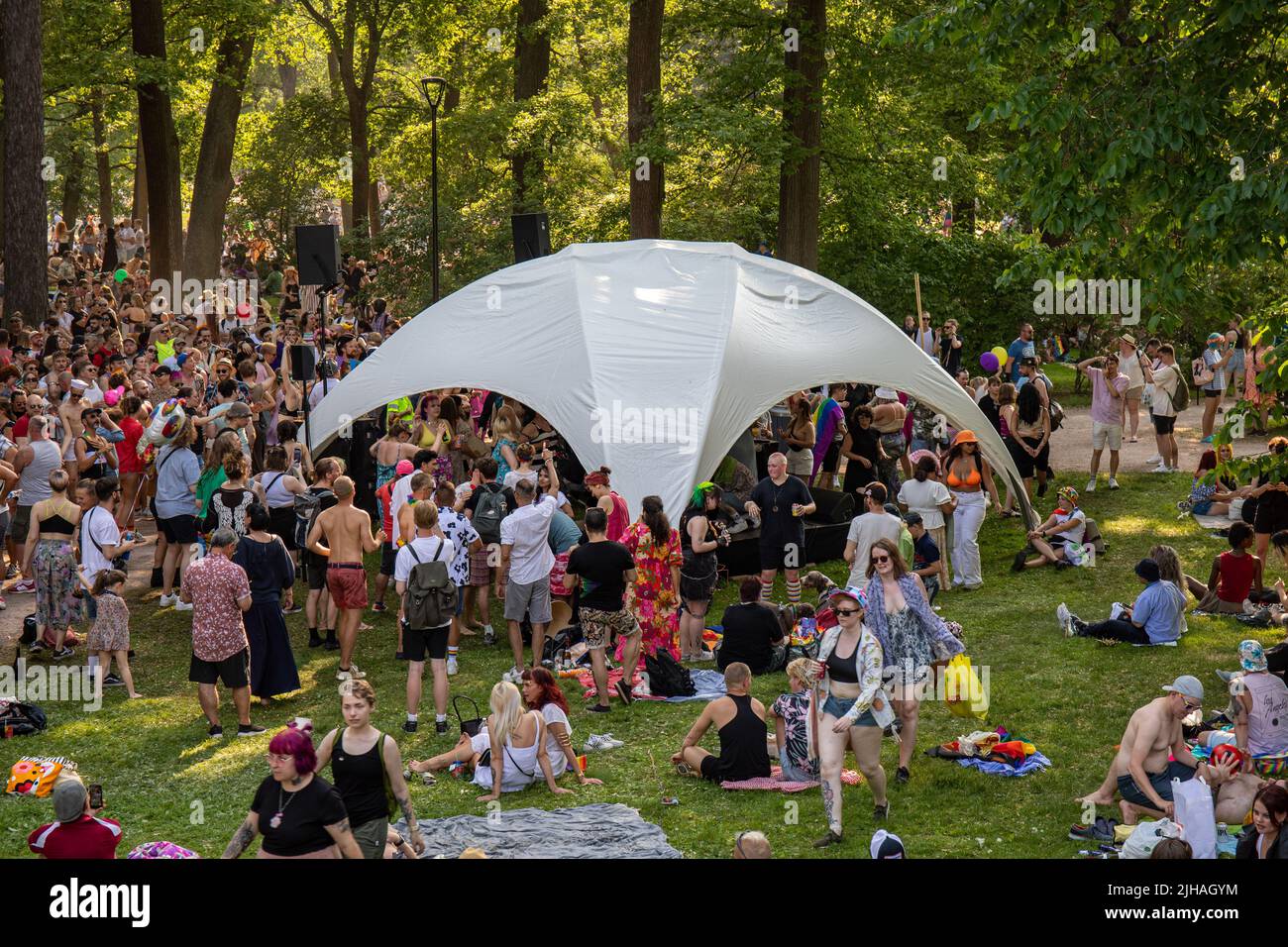 People dancing around DJ tent at Helsinki Pride Park Picnic in ...