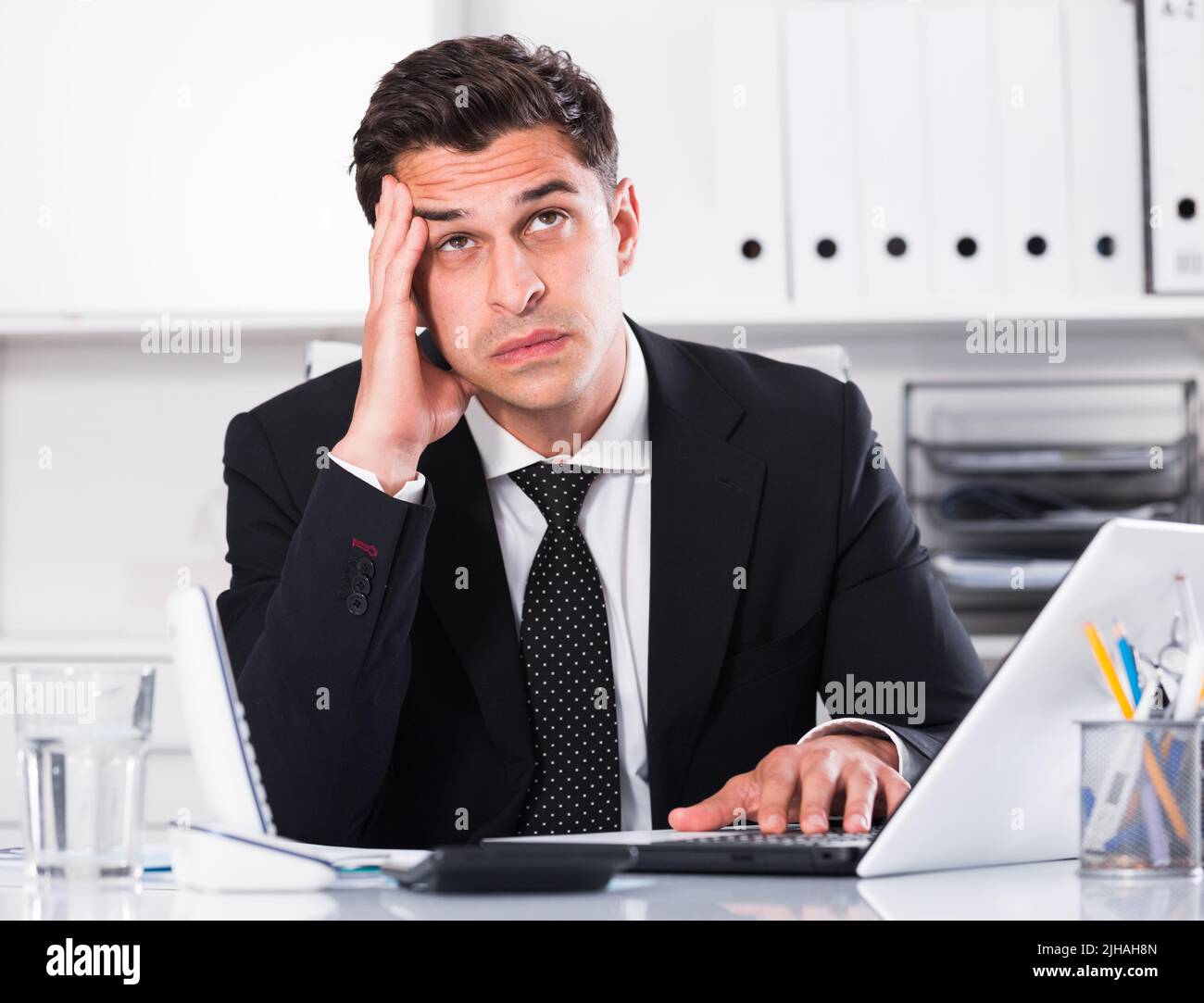 Worried man reading correspondence hi-res stock photography and images ...