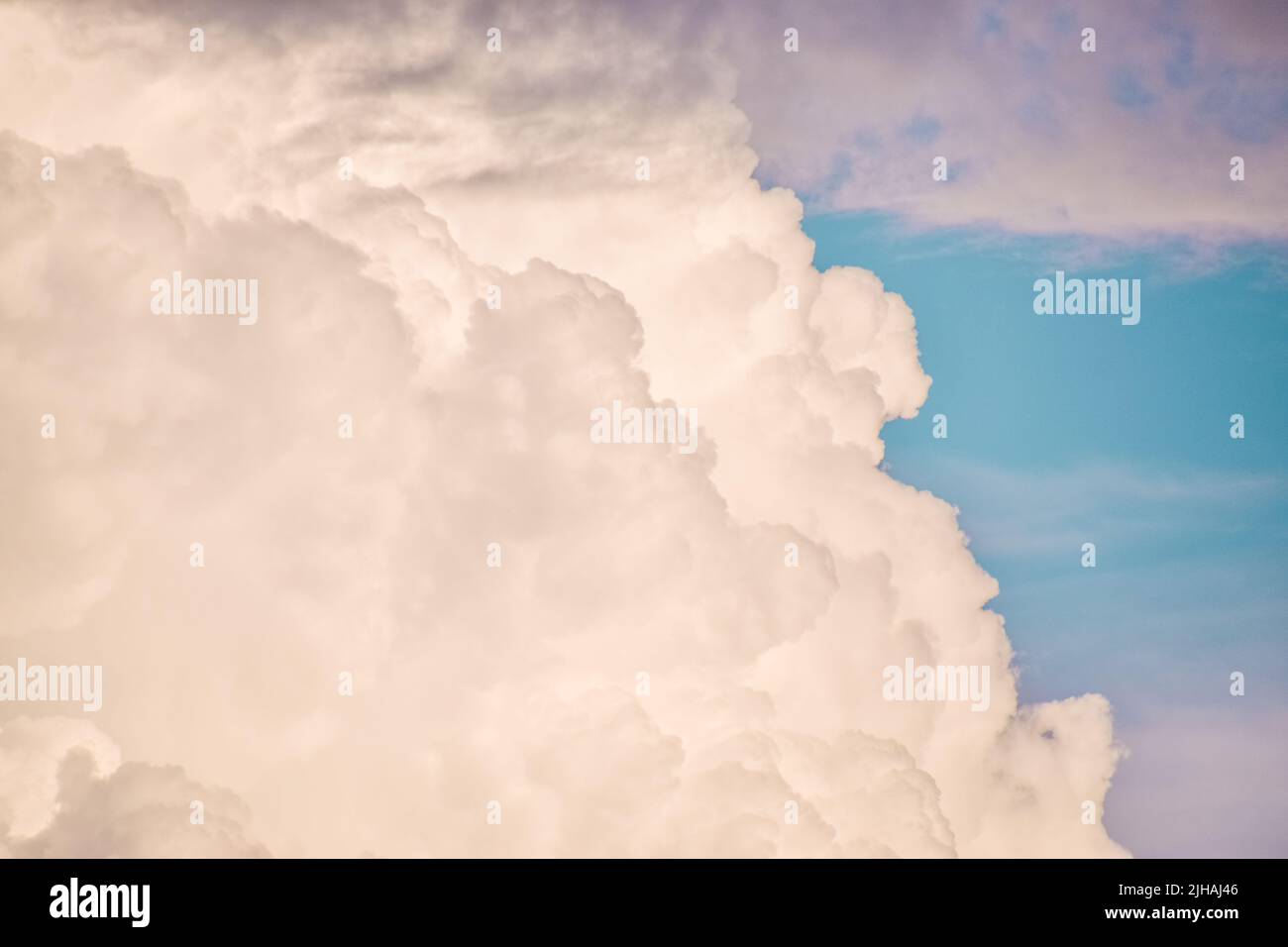 An aesthetic background with soft clouds against the blue sky Stock Photo - Alamy